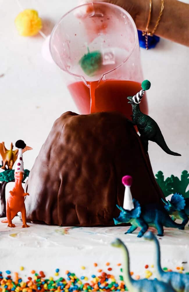 Exploding Volcano Cake with dinosaurs! - Oh So Delicioso